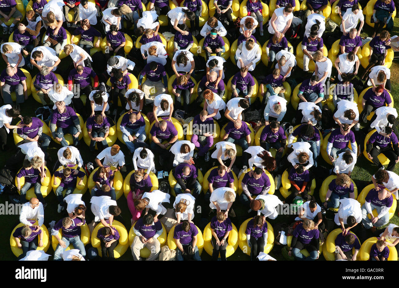 154 people in inflatable chairs are massaged in world's largest group ...