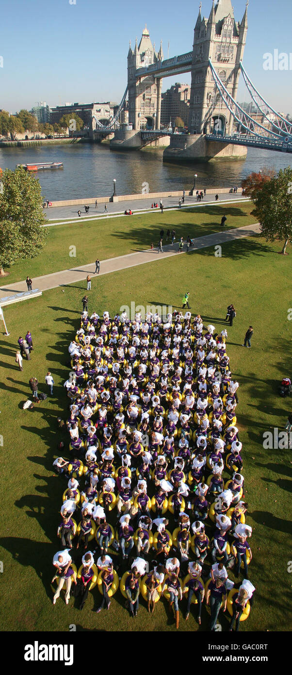 154 people in inflatable chairs are massaged in world's largest group ...