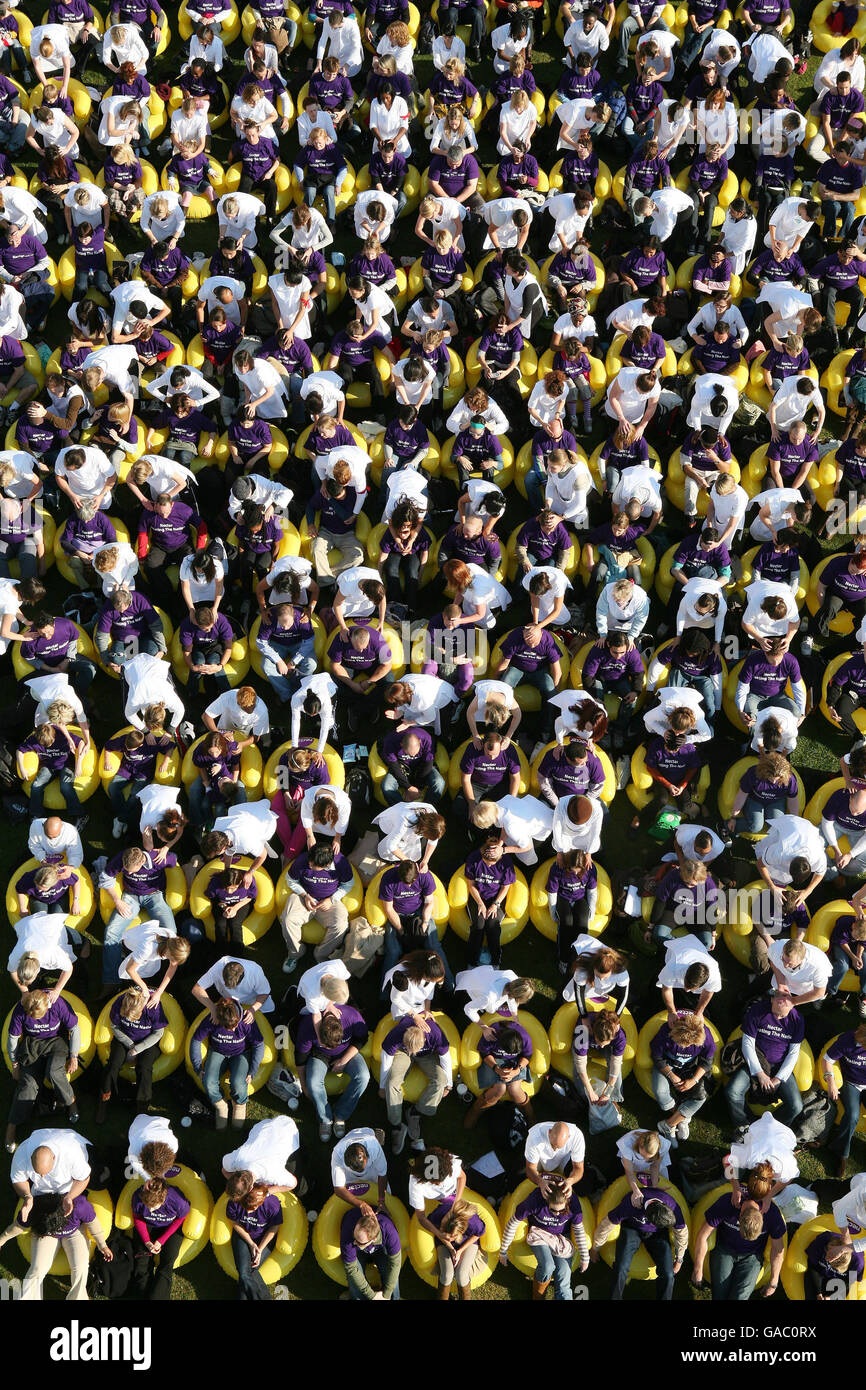154 people in inflatable chairs are massaged in world's largest group ...