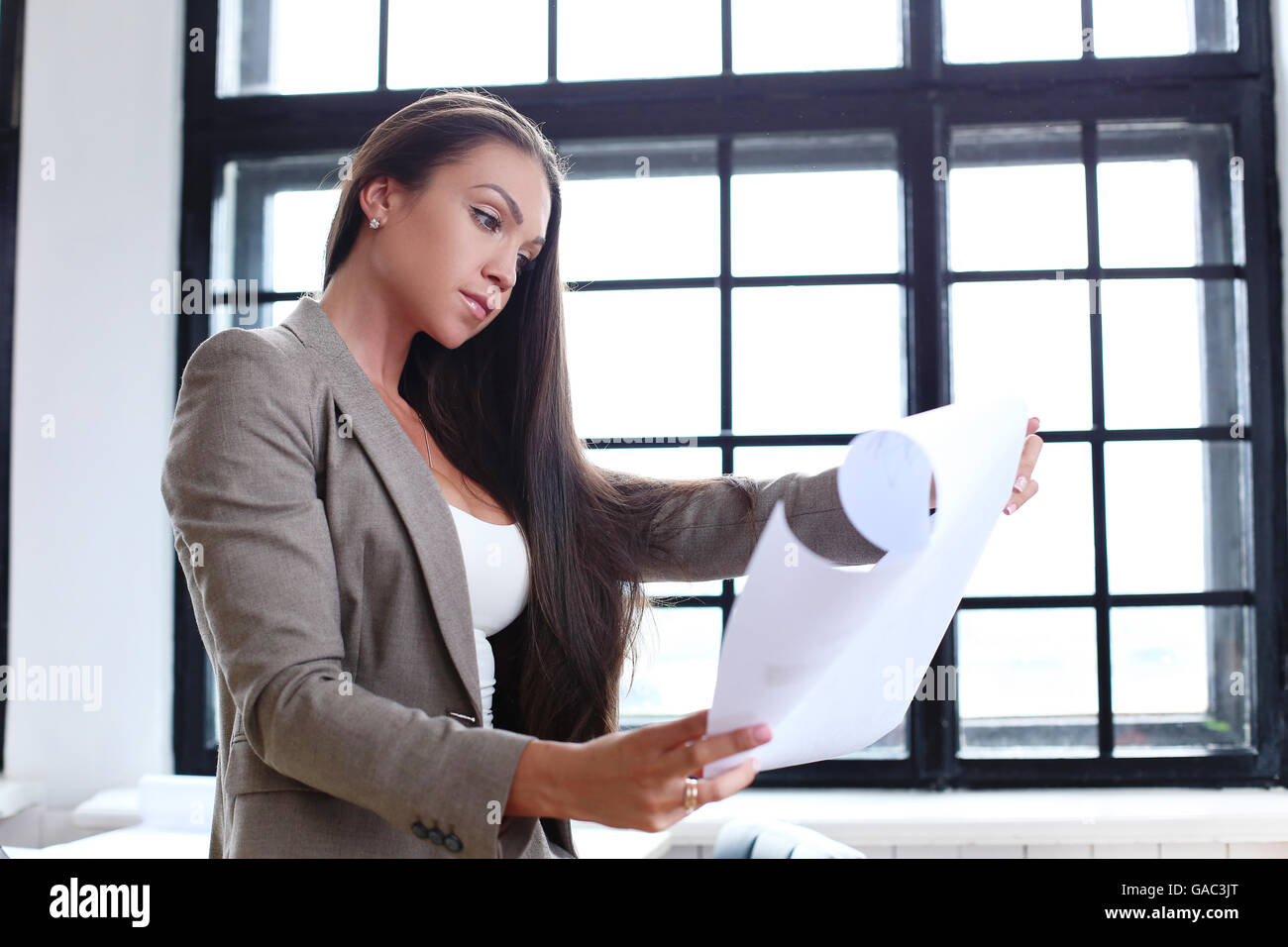 Portrait gorgeous woman ceo standing hi-res stock photography and ...