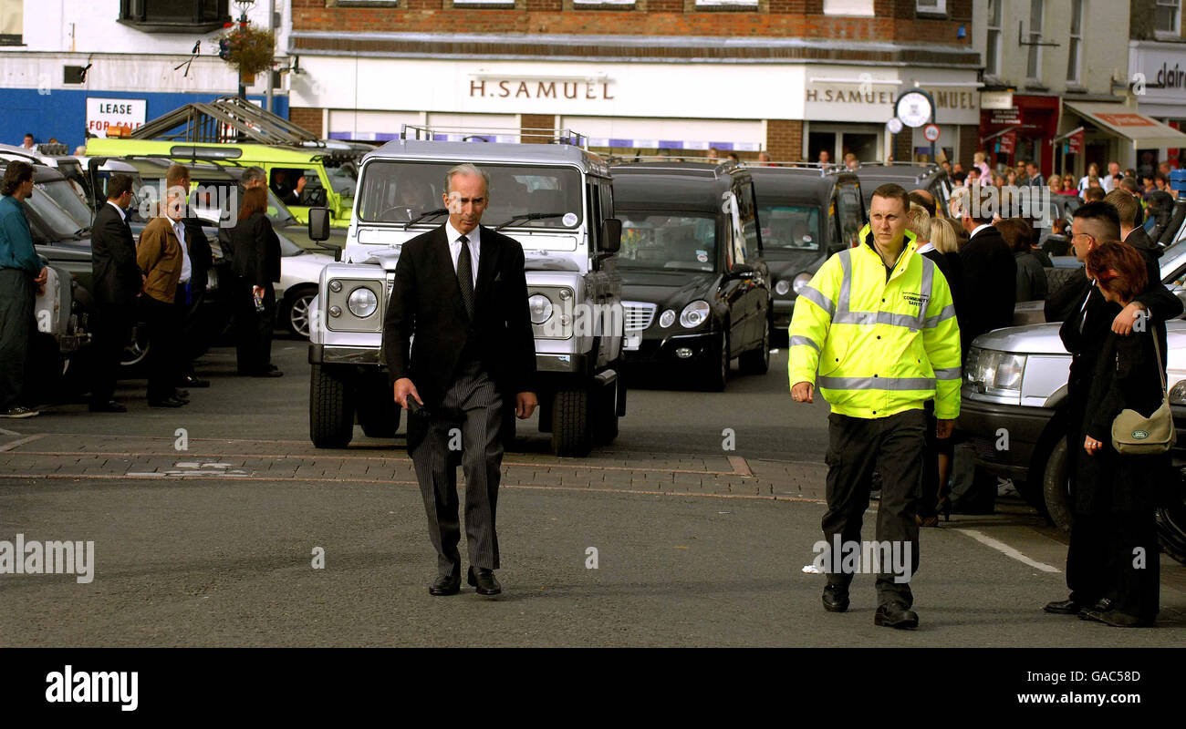 A Land Rover carrying the coffin of Thor, one of four children who died ...