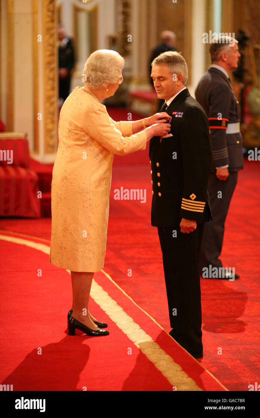 Receives an obe from the queen at buckingham palace hi-res stock ...