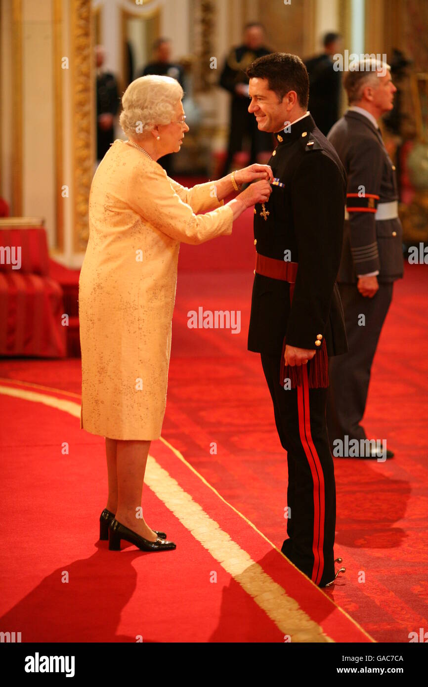 Major Darren Corrie receives an MBE from The Queen at Buckingham Palace ...