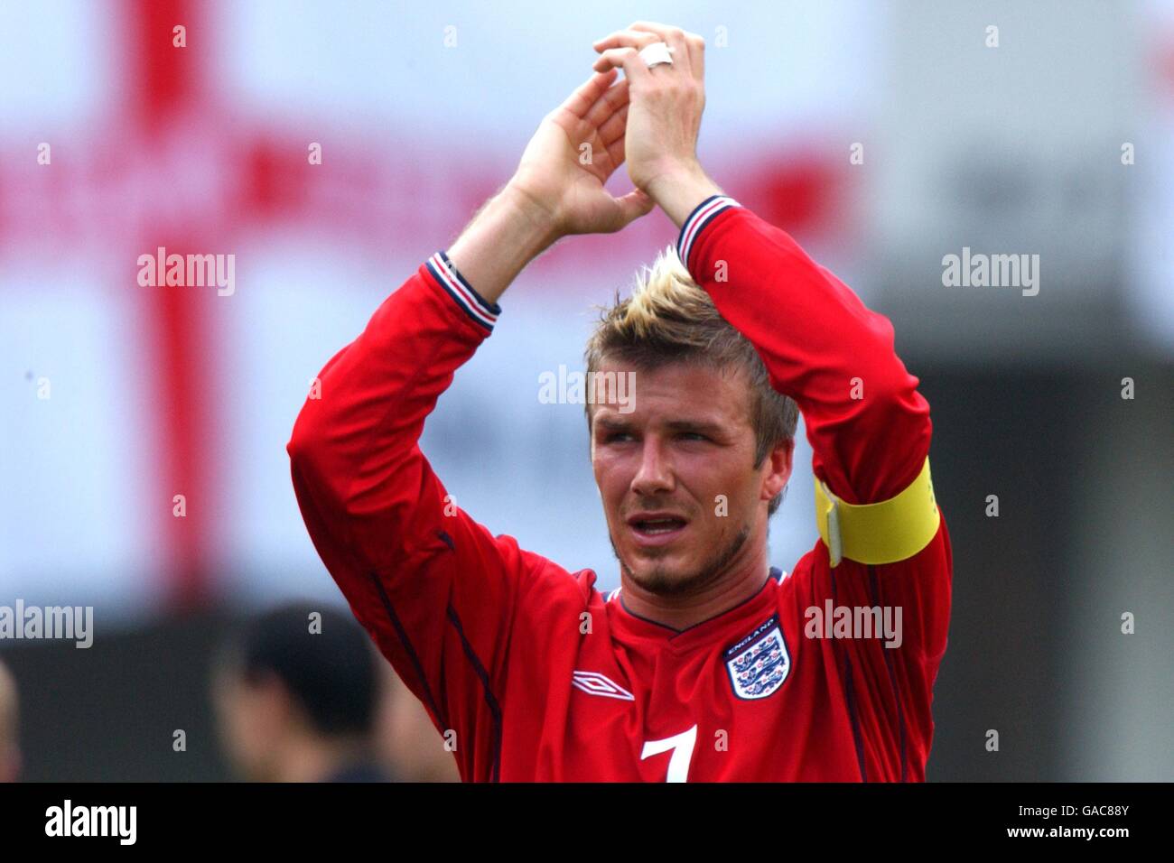 England Captain David Beckham celebrates their draw against Nigeria saw ...