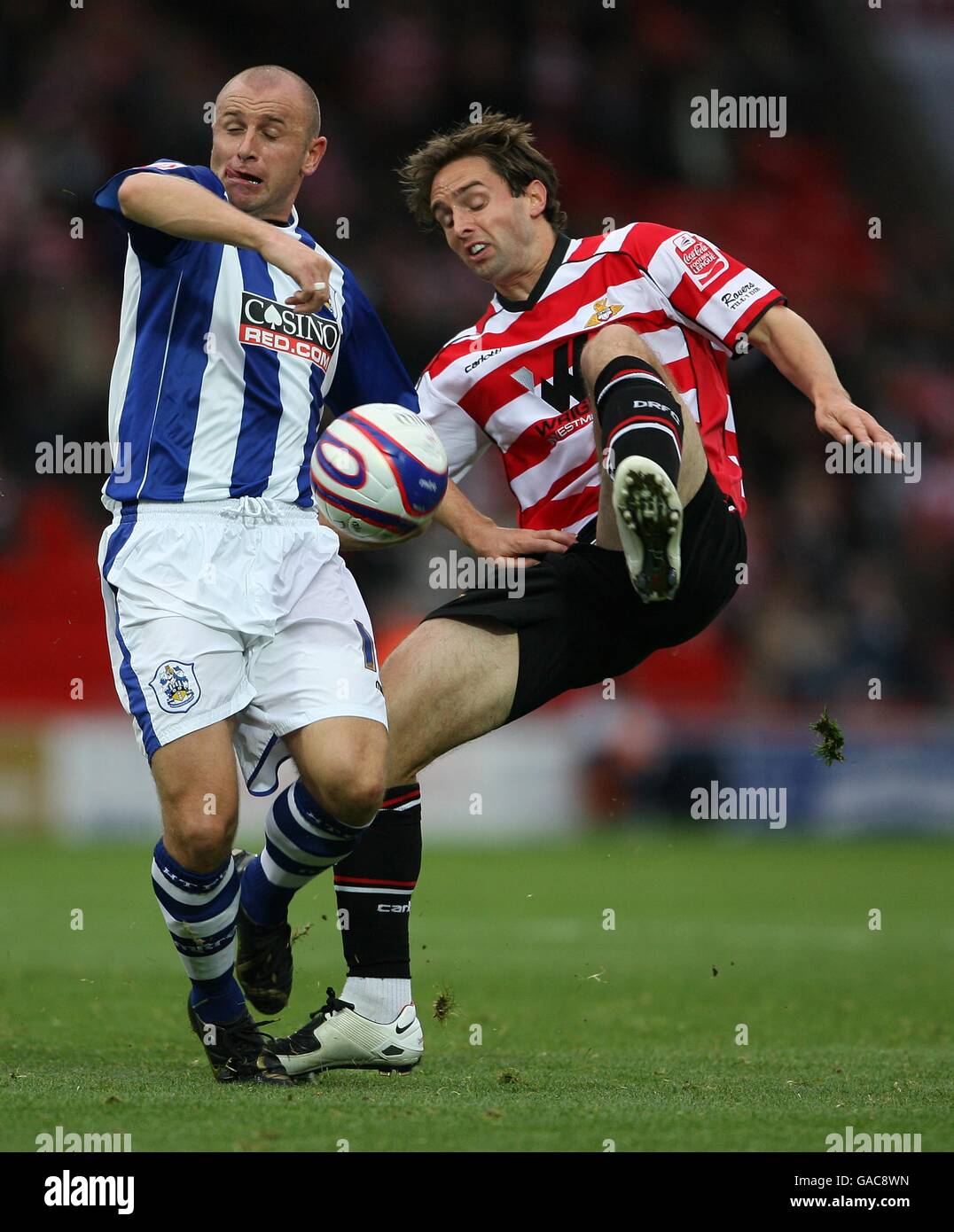 Doncaster Rovers Mark Wilsonand Huddersfield Town's Ronnie Wallwork ...