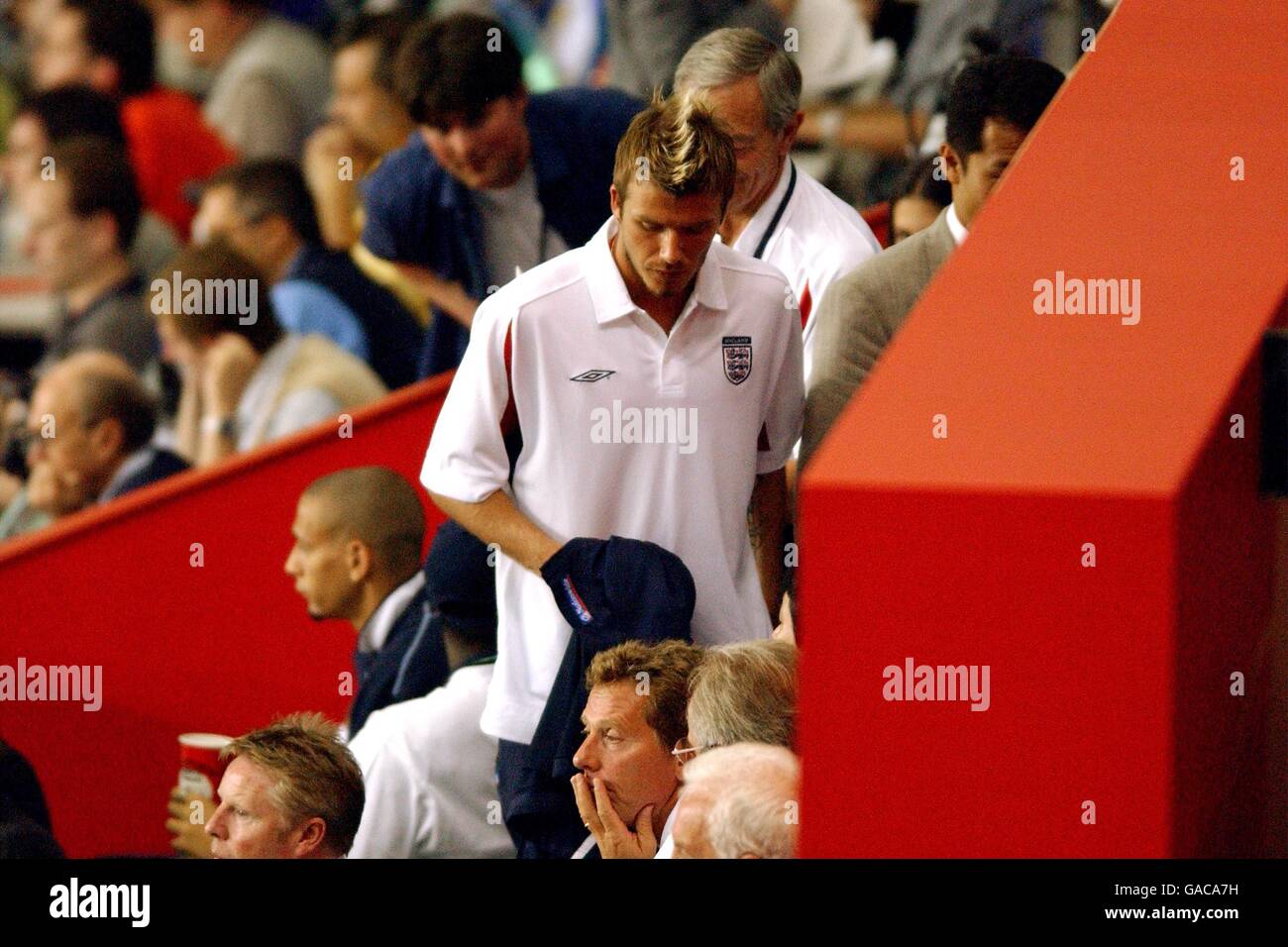 England captain David Beckham makes his way to his seat as he watches ...