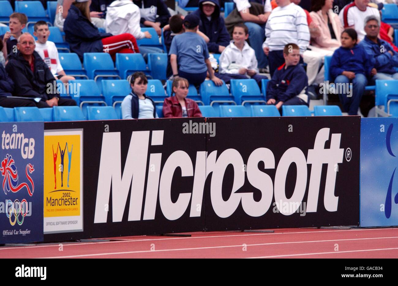 Athletics - Aqua-Pura Commonwealth Trials. Fans watch the events behind ...