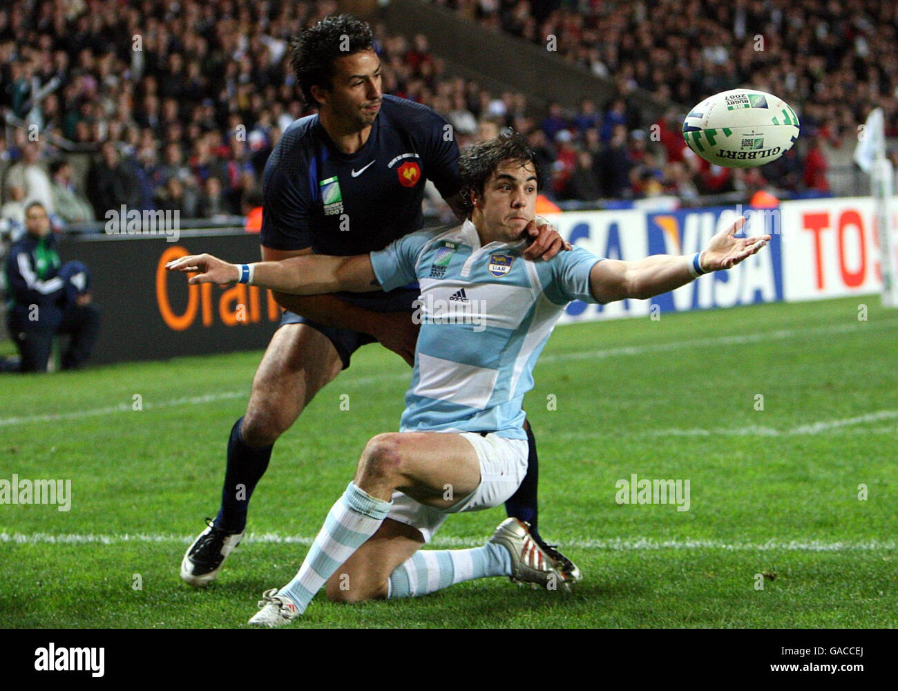 France's Clement Poitrenaud (left) and Argentina's Horacio Agulla ...