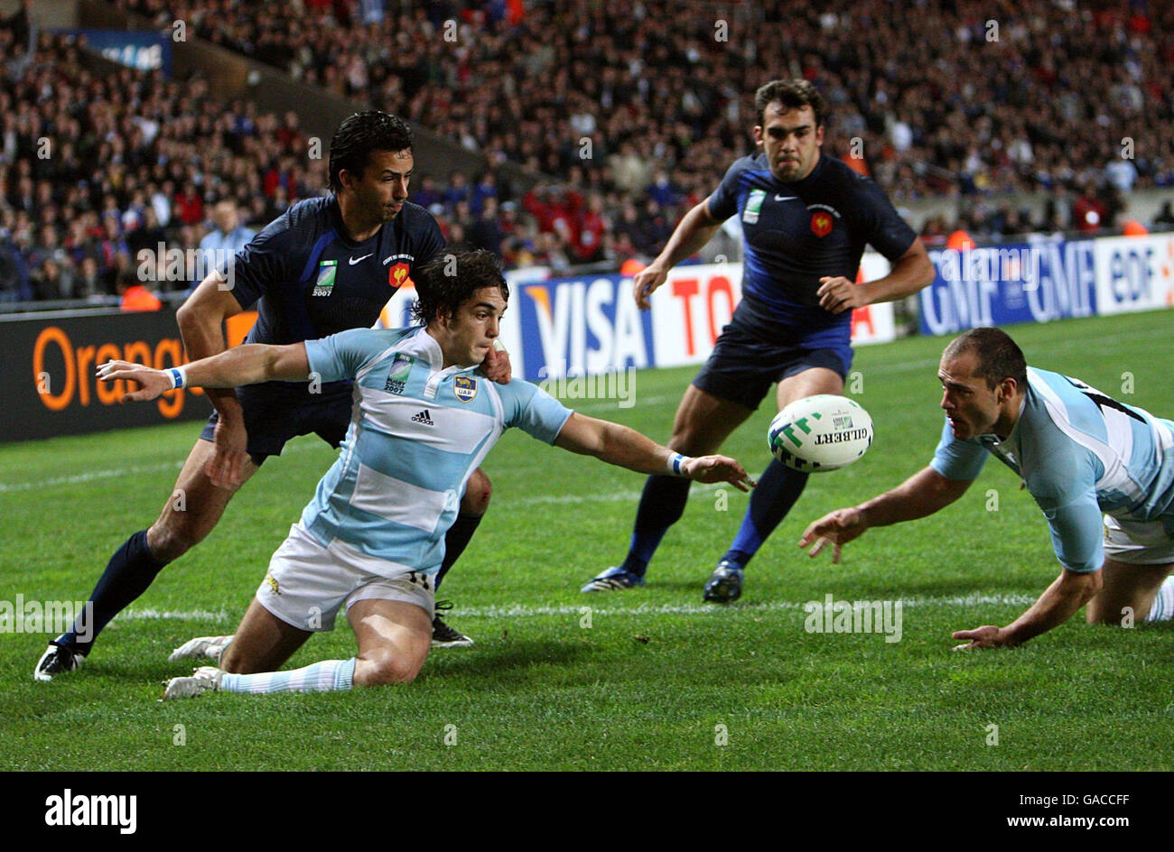 France's Clement Poitrenaud (left) and Argentina's Horacio Agulla ...