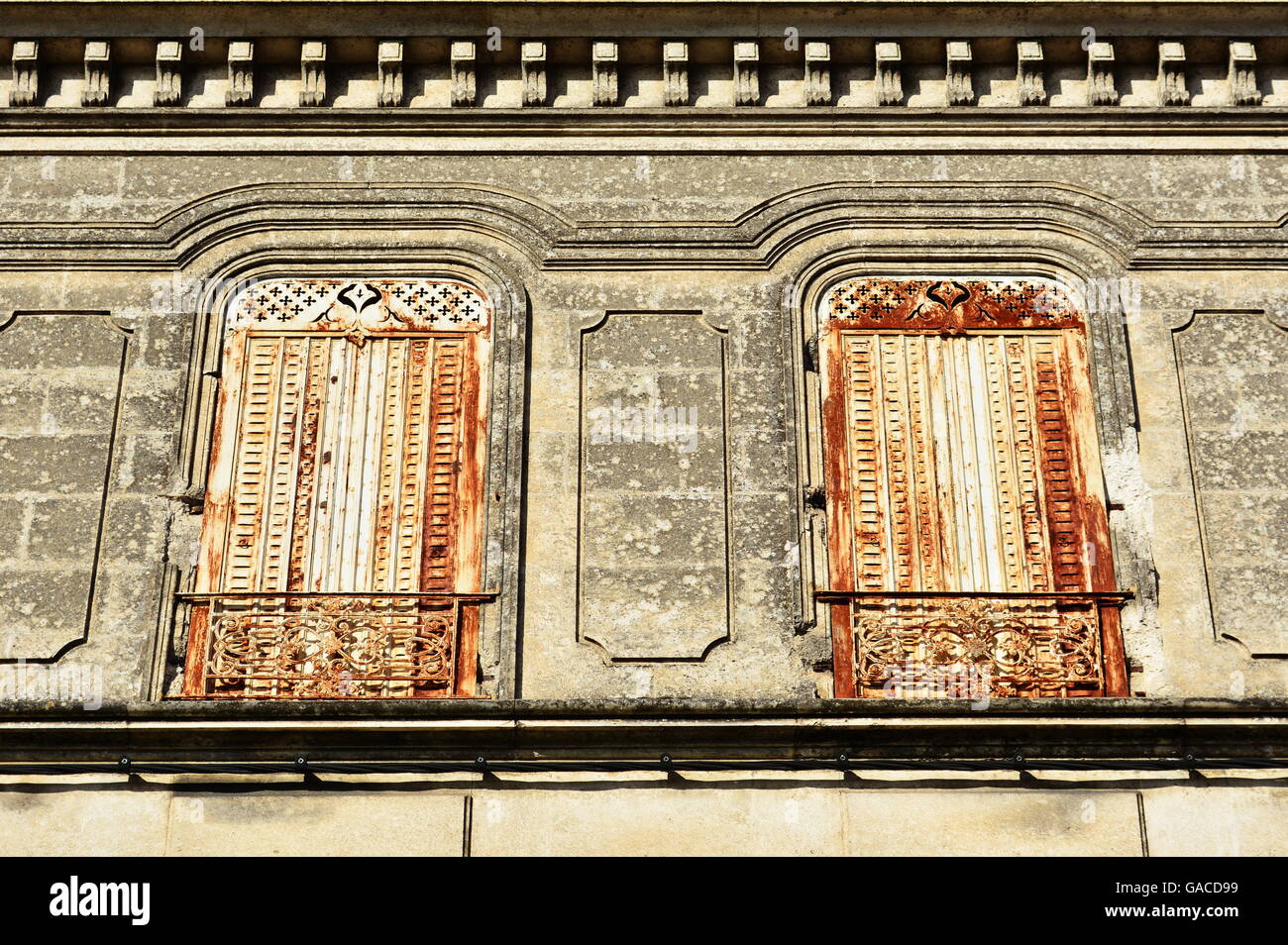 Large white weathered and rusty closed window metal shutters Stock ...