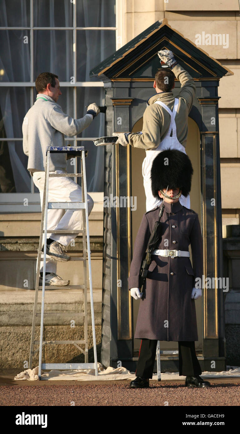 Decorators paint Grenadier Guards sentry box Stock Photo - Alamy