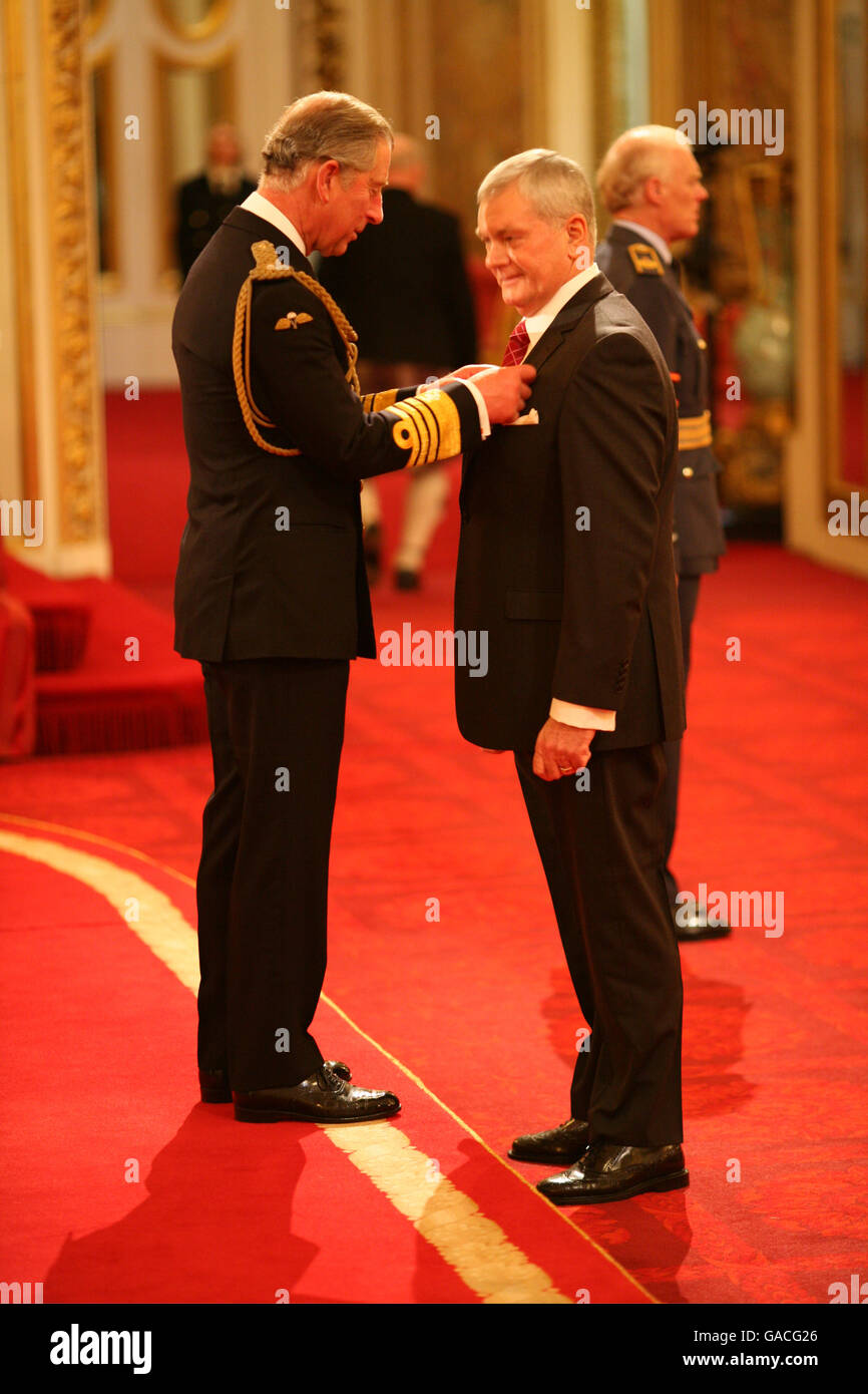 Mr. Bernard Crimp from Redhill is made an MBE by the Prince of Wales at Buckingham Palace Stock ...