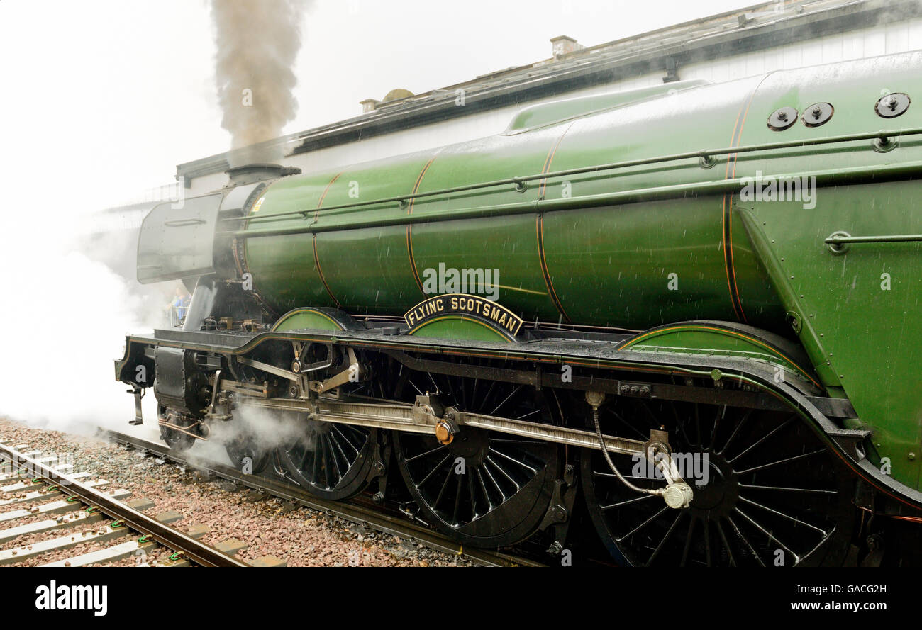 Rain, smoke and steam. World famous steam locomotive "Flying Scotsman ...