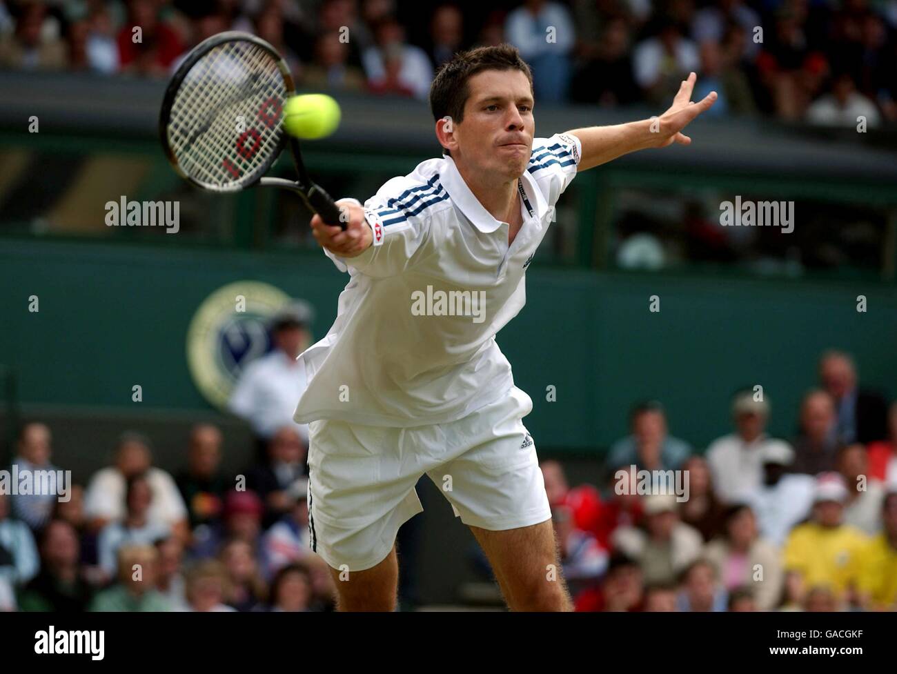 Tim Henman lunges for the ball against Wayne Ferreira Stock Photo - Alamy