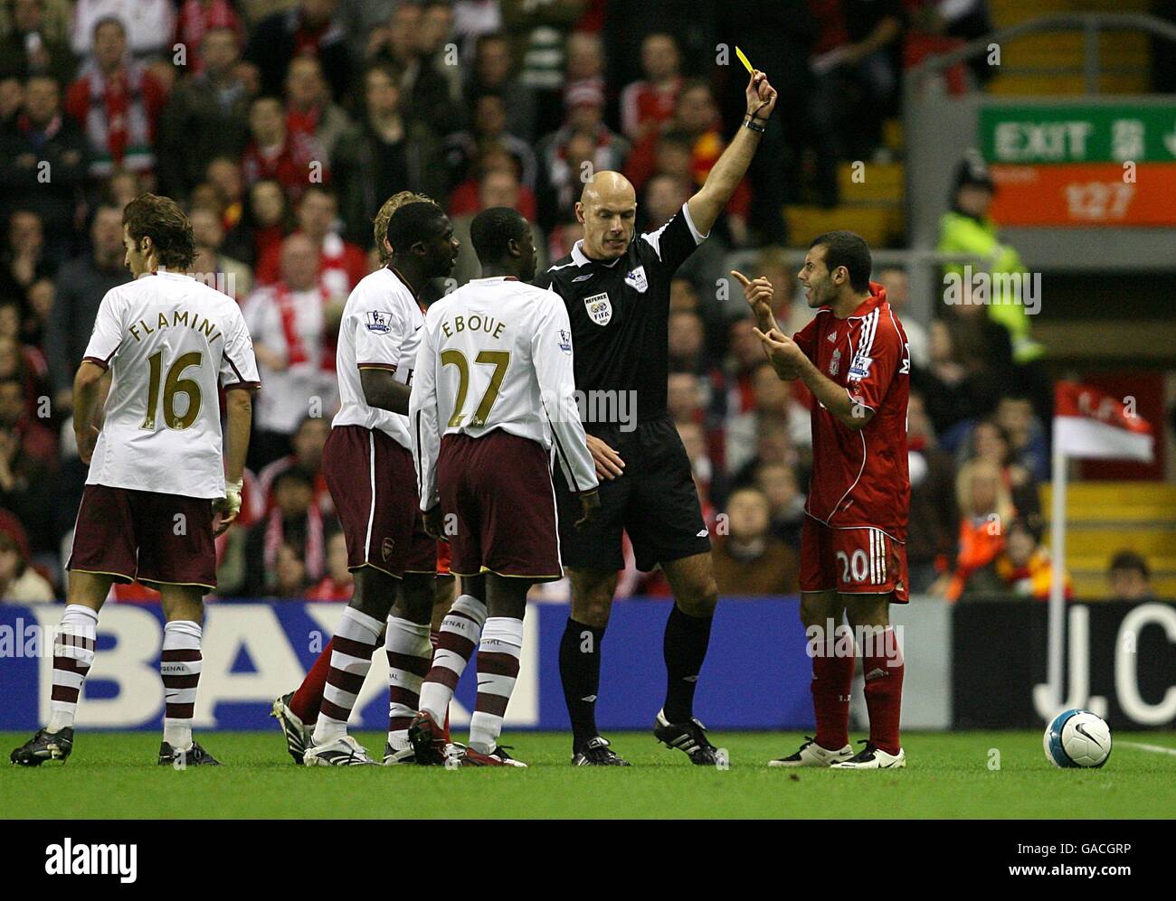 Liverpools javier mascherano is shown yellow card by referee webb hi ...