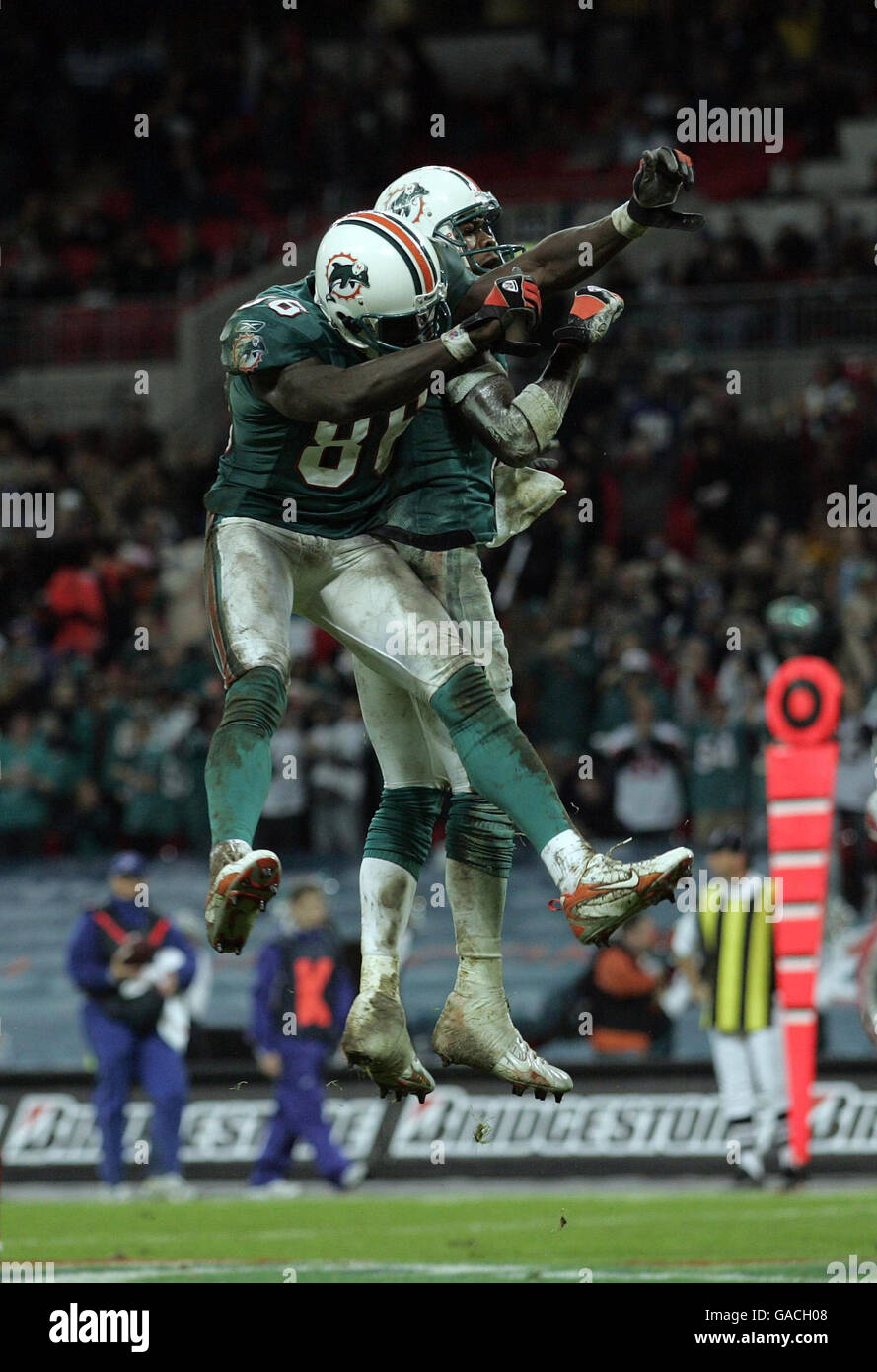 Miami Dolphins' Ted Ginn JR celebrates scoring a touchdown during the ...