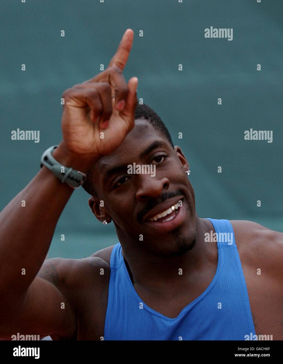 Dwain chambers celebrates winning 100m race hi-res stock photography ...