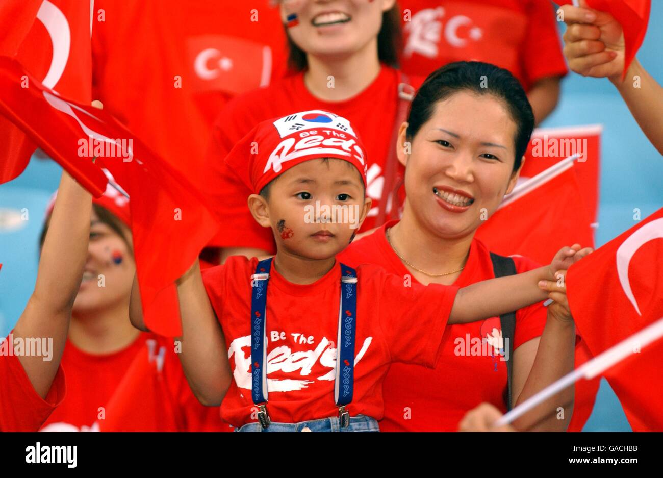 A young korean fan cheers on his team hi-res stock photography and ...