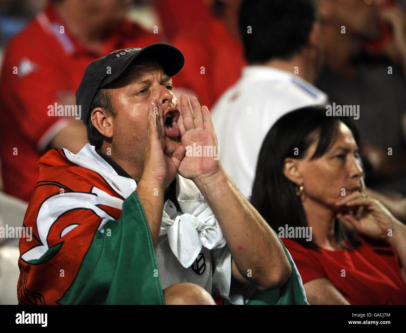 Welsh fans boo their team after they lose during the UEFA European ...