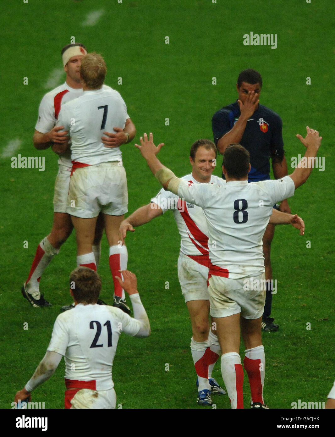 England players celebrate at the final whistle as they defeat France ...