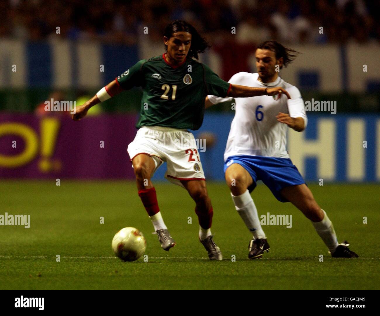 Crisitano Zanetti of Italy is held off by Mexico's Jesus Arellano Stock ...
