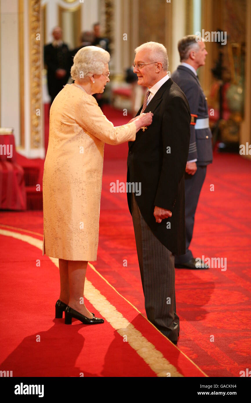 Mr. Douglas Mobsby, from Cheam, receives an MBE from The Queen at ...