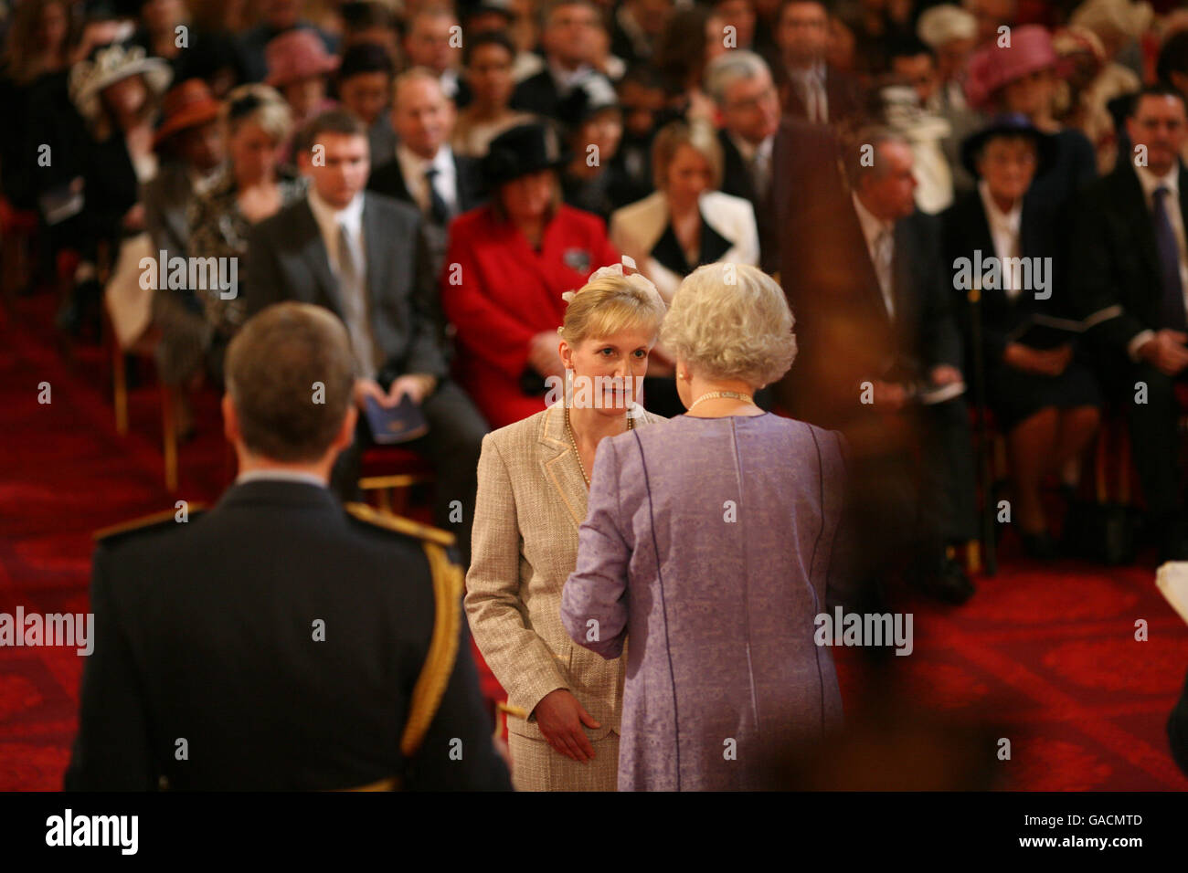 Mrs Susan Matthews is made an MBE by The Queen at Buckingham Palace ...