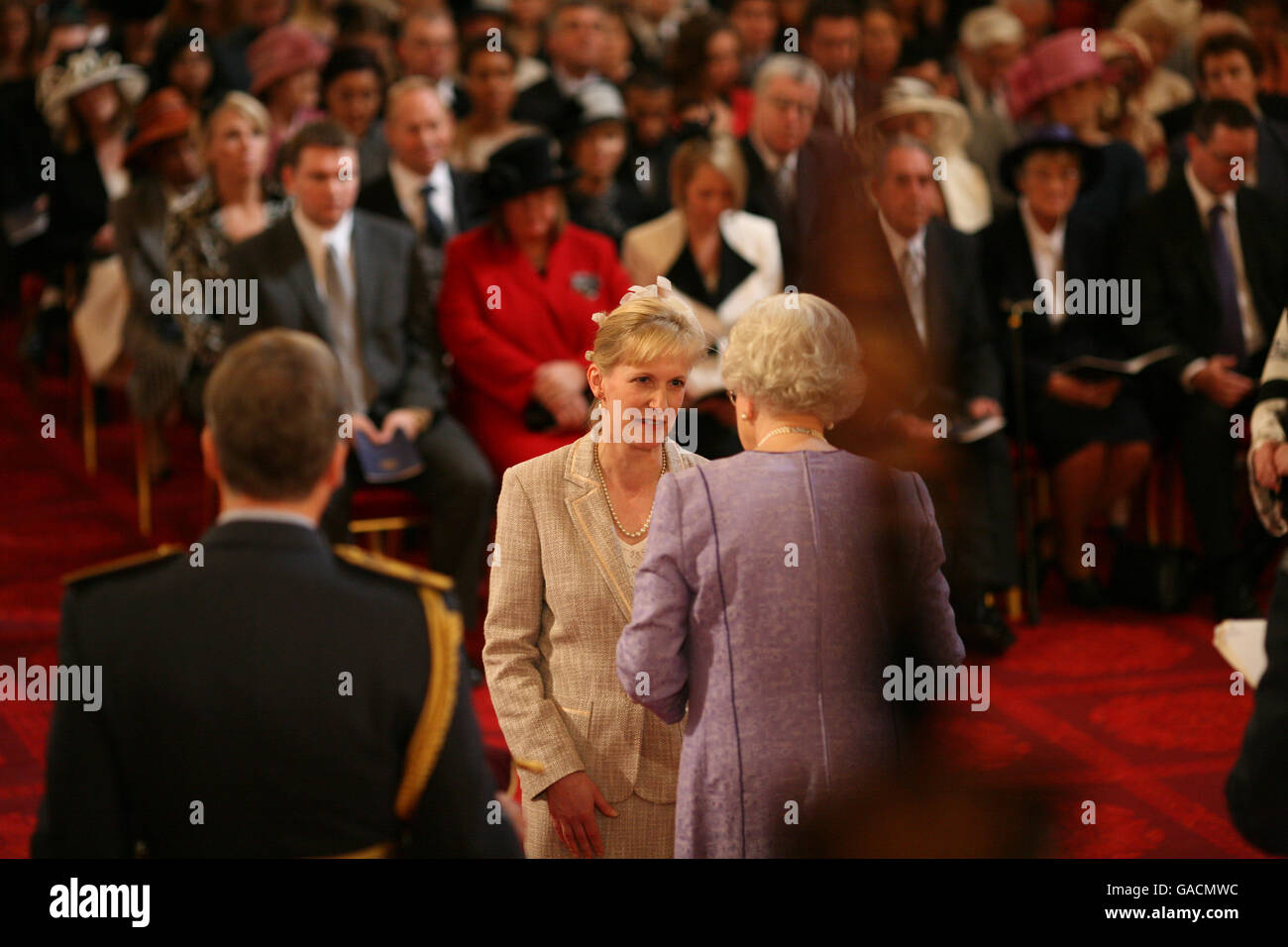 Mrs Susan Matthews is made an MBE by The Queen at Buckingham Palace ...