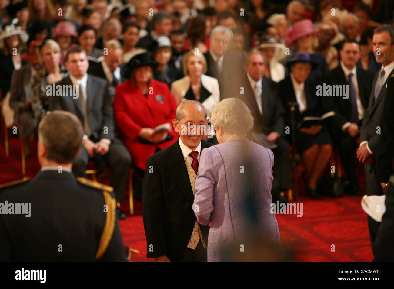 Mr. Mitsusuke Harada, from Cwmbran, is made an MBE by The Queen at ...