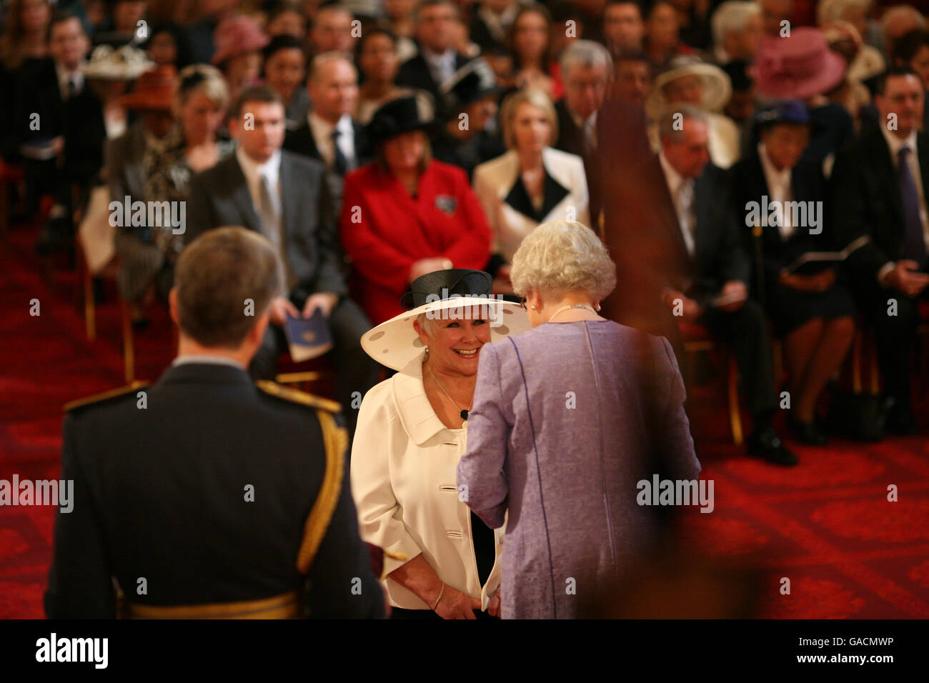 Mrs Jan Howell, from Manchester, is made an MBE by The Queen at ...
