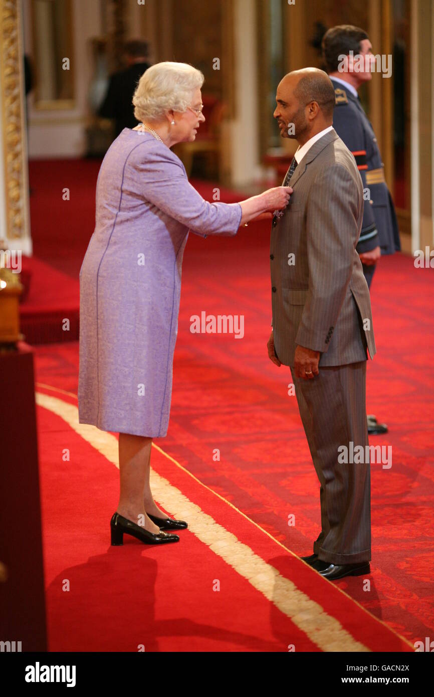 Mr. John Wyke is made an MBE by The Queen at Buckingham Palace Stock ...