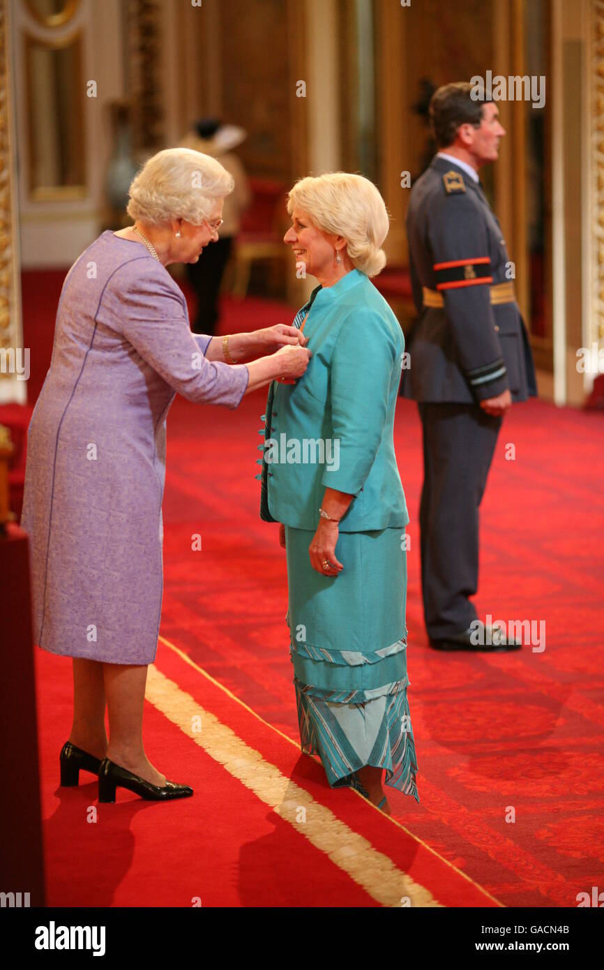 Mrs Jean Stanley Jones is made an MBE by The Queen at Buckingham Palace ...