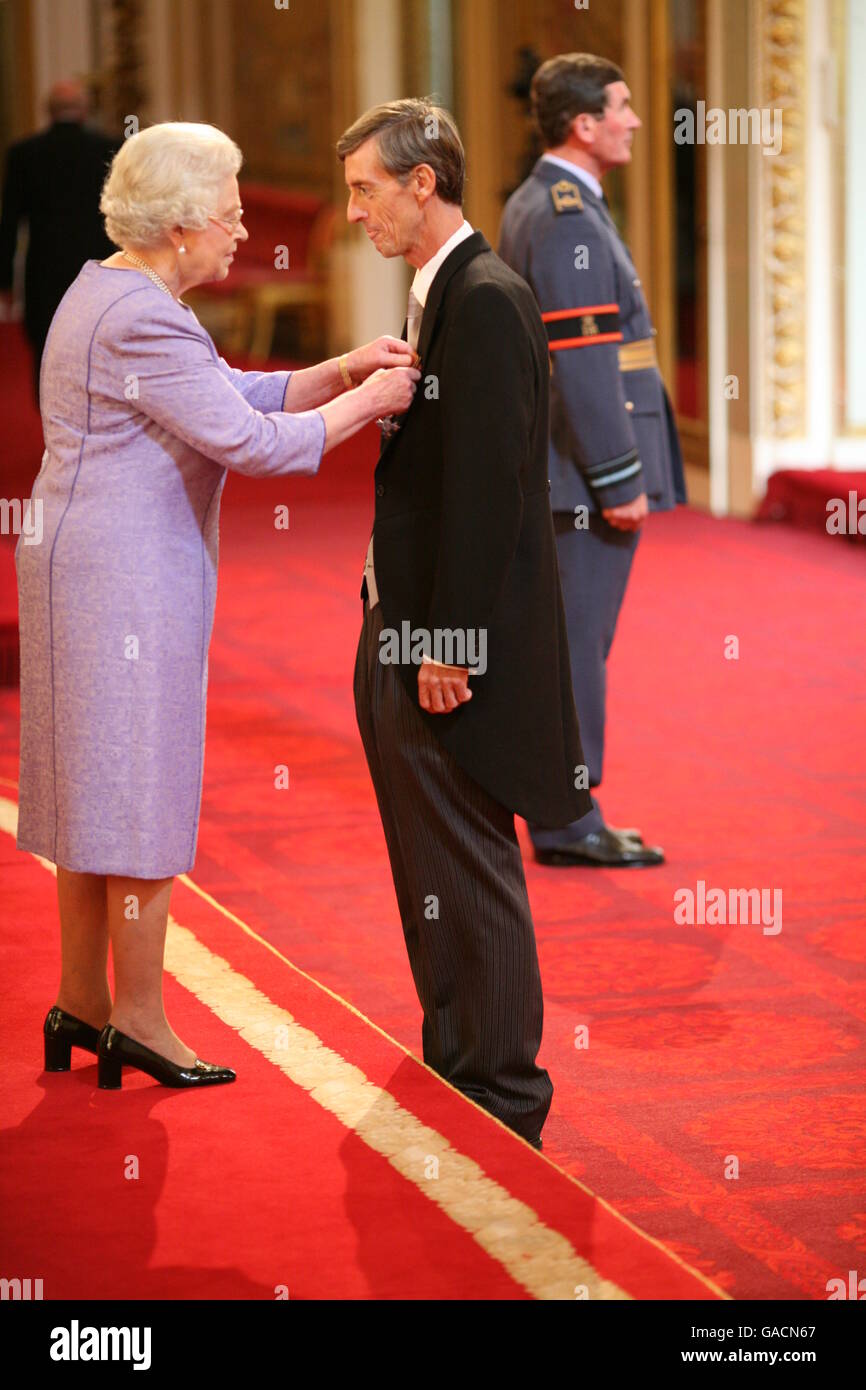 Is made an mbe by the queen at buckingham palace hi-res stock ...
