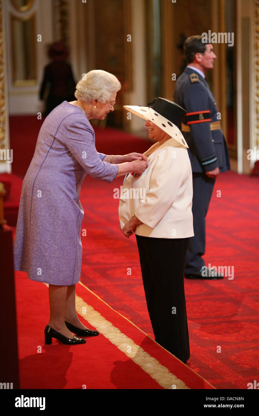 Mrs Jan Howell, from Manchester, is made an MBE by The Queen at ...