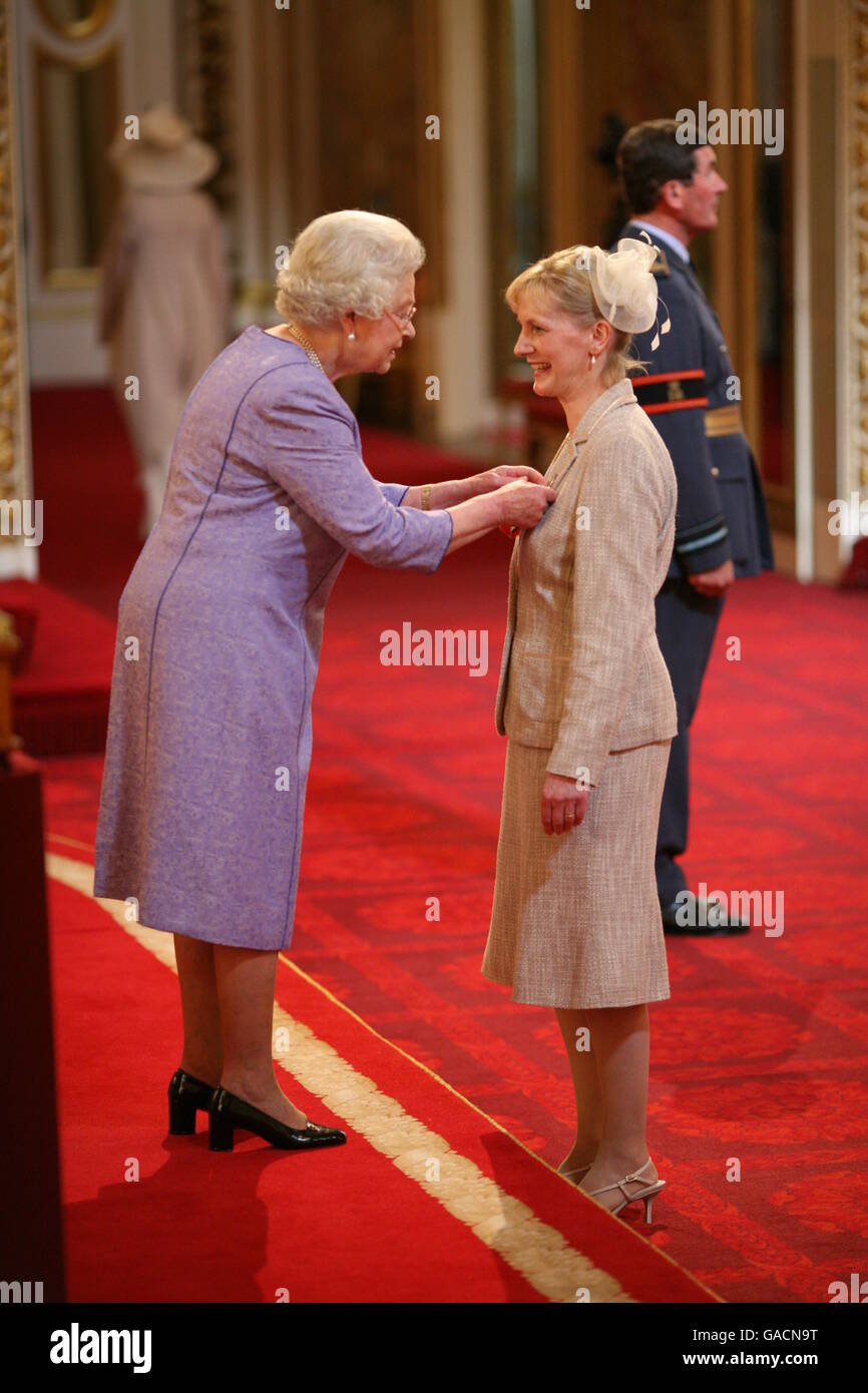 Mrs Susan Matthews is made an MBE by The Queen at Buckingham Palace ...