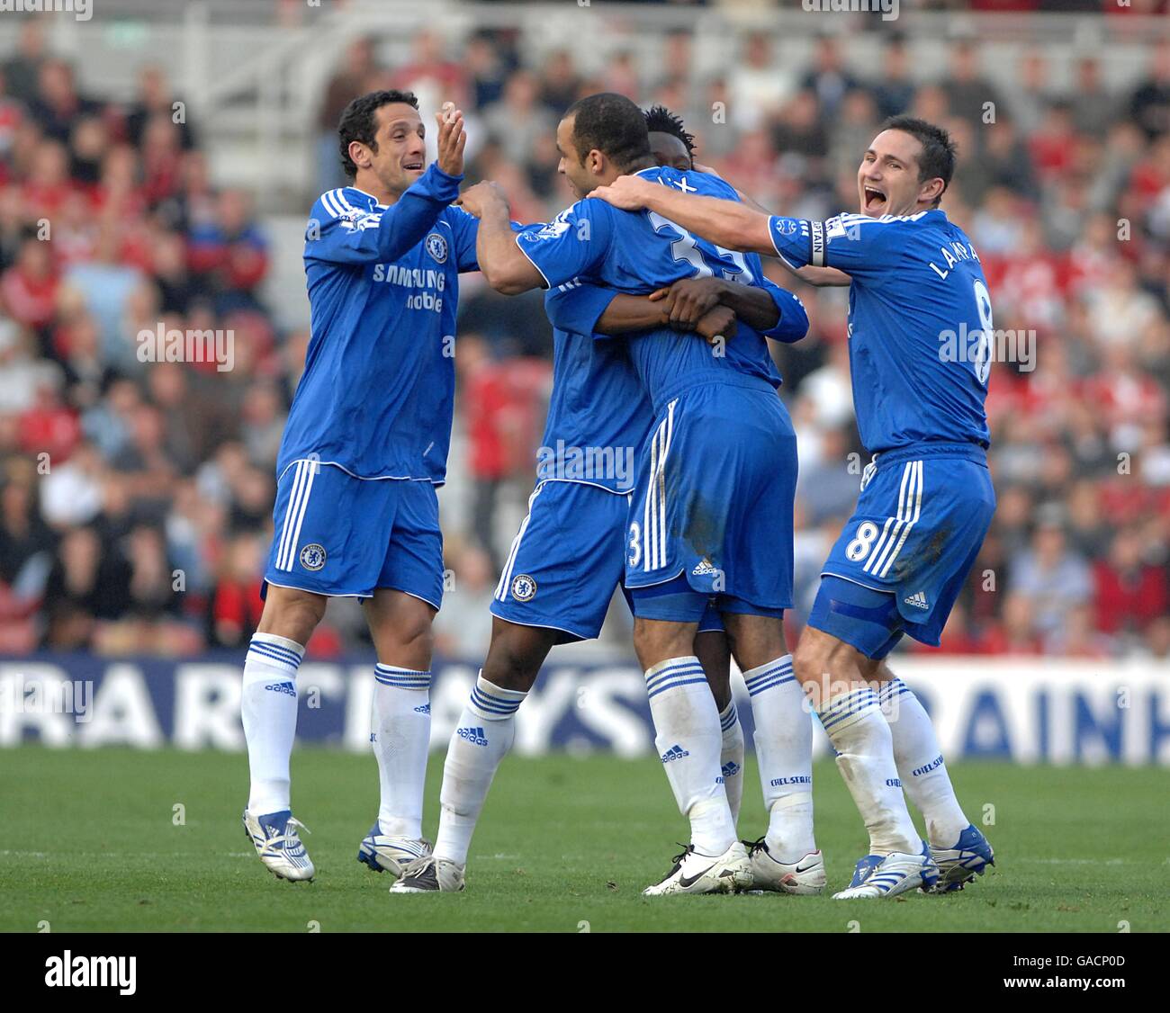 Chelsea's Alex celebrates his goal with his Chelsea team mates Stock ...