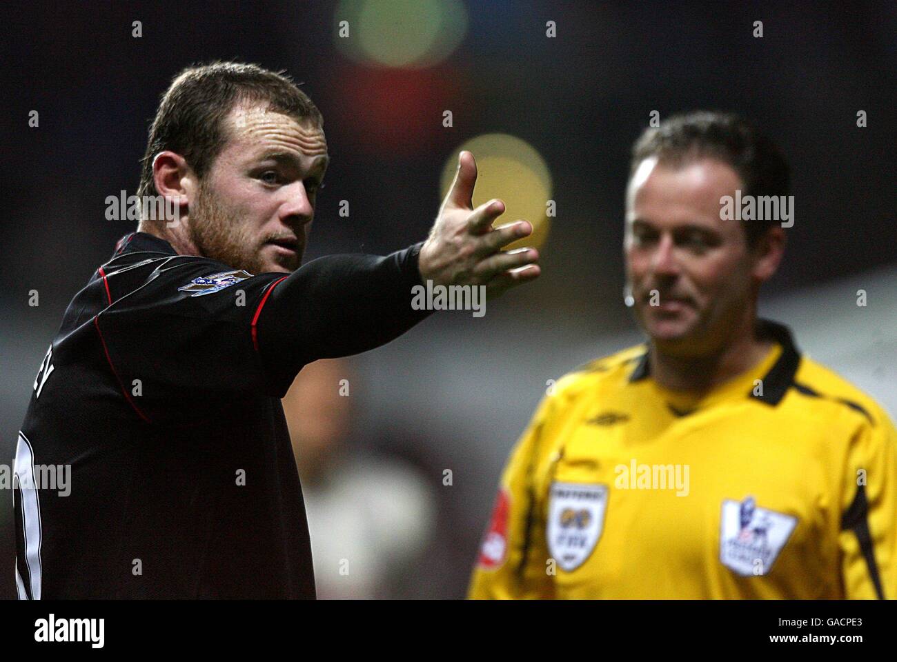 Manchester uniteds wayne rooney appeals to referee rob styles hi-res ...