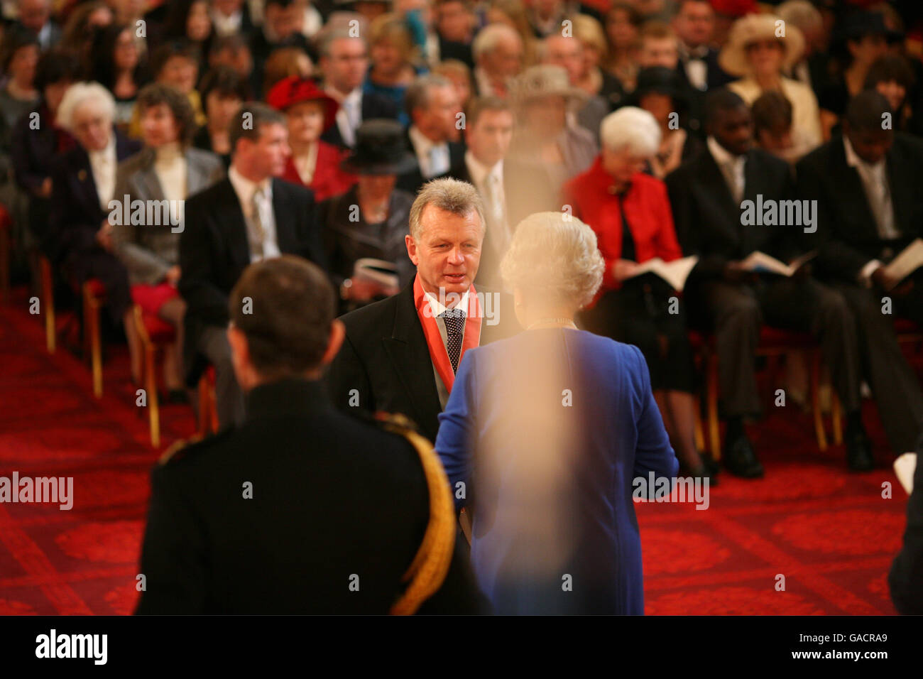 Mr. Paul Lester, from Poole, is made a CBE by The Queen at Buckingham ...