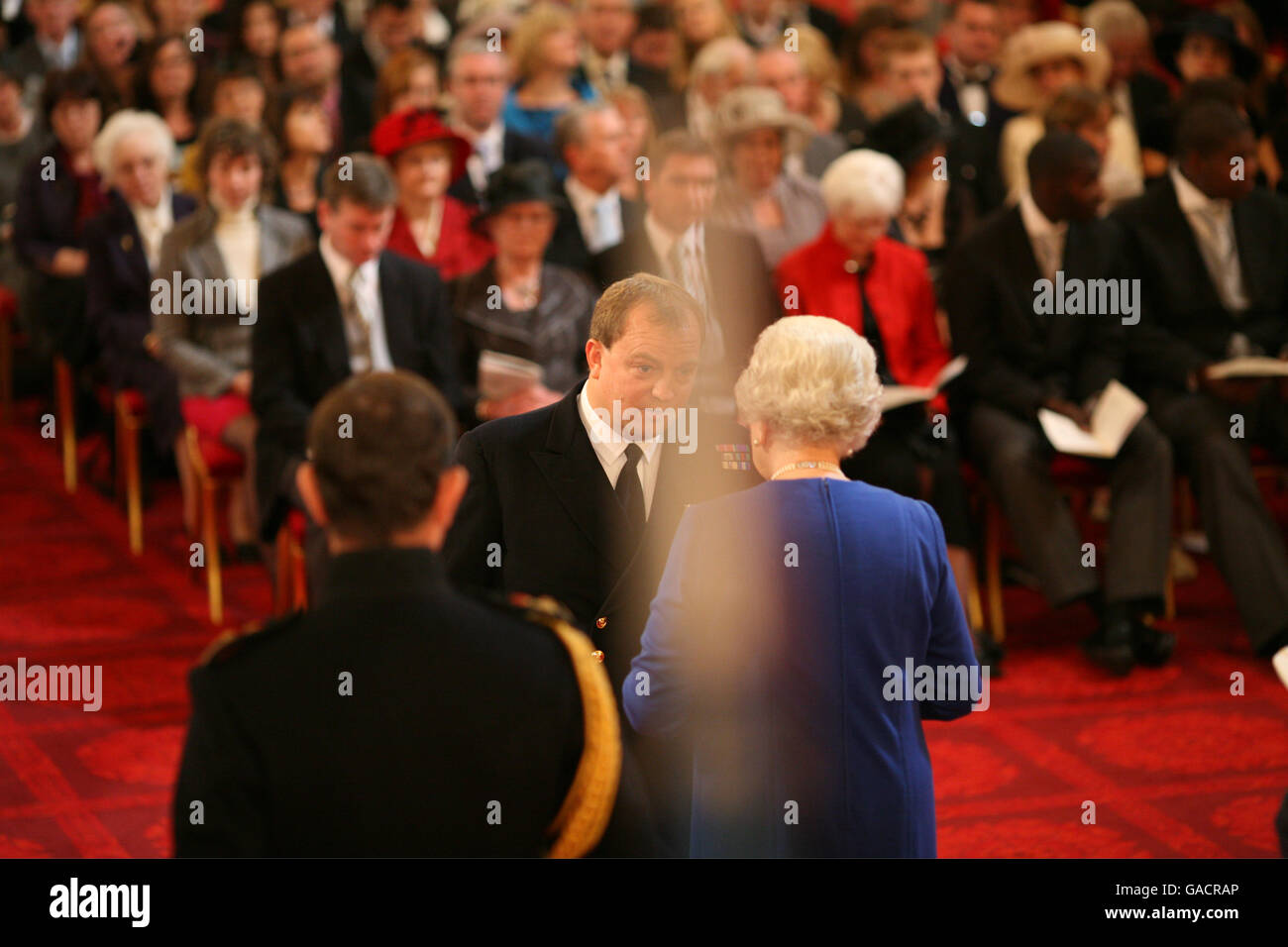 Commander christopher slocombe made obe by queen buckingham palace hi ...