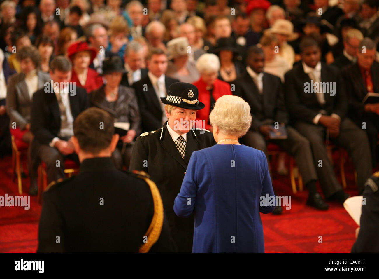 Mrs Christine Twigg receives The Queen's Police Medal from The Queen at ...