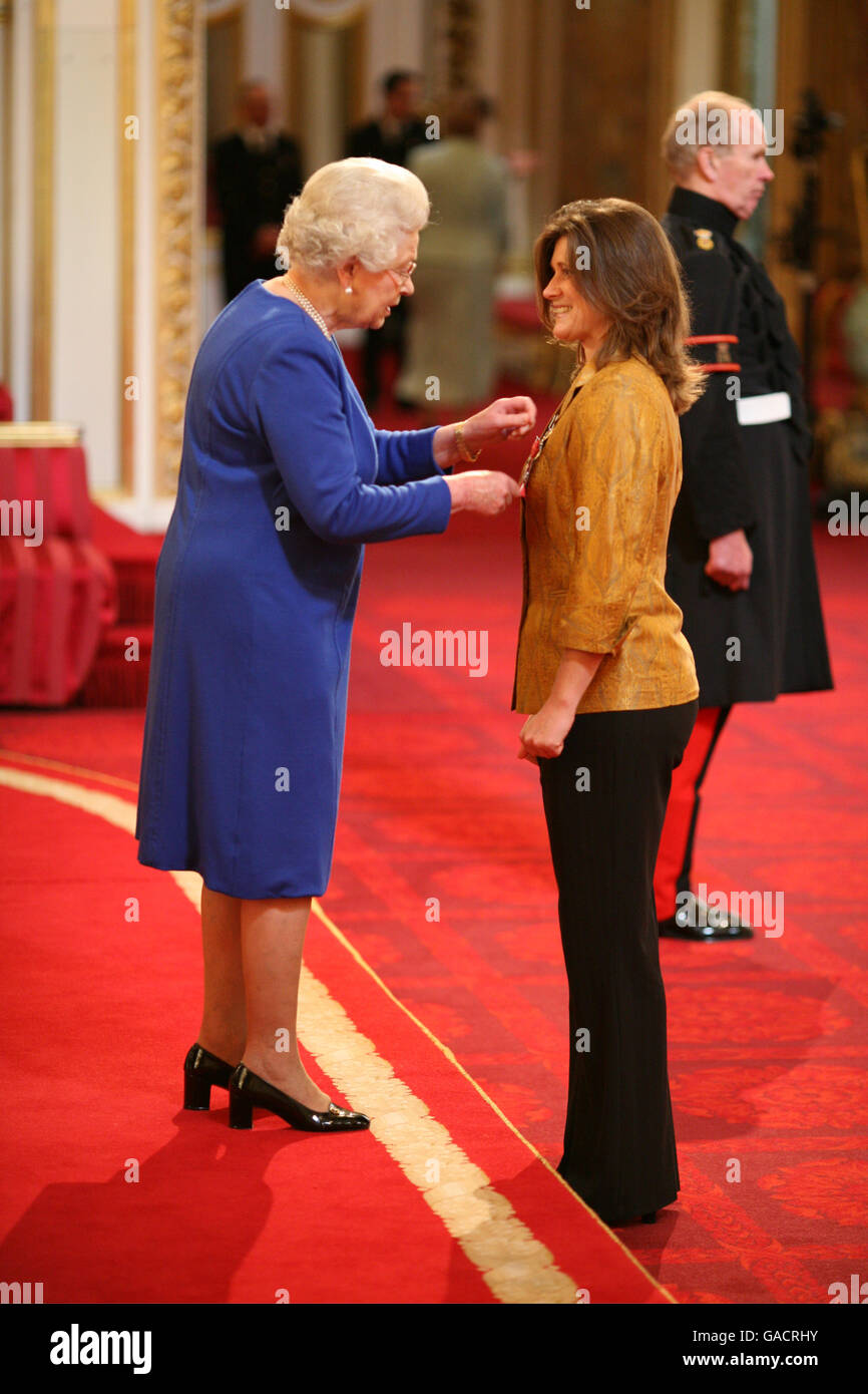 Miss Cindy Parker is made an MBE by The Queen at Buckingham Palace ...