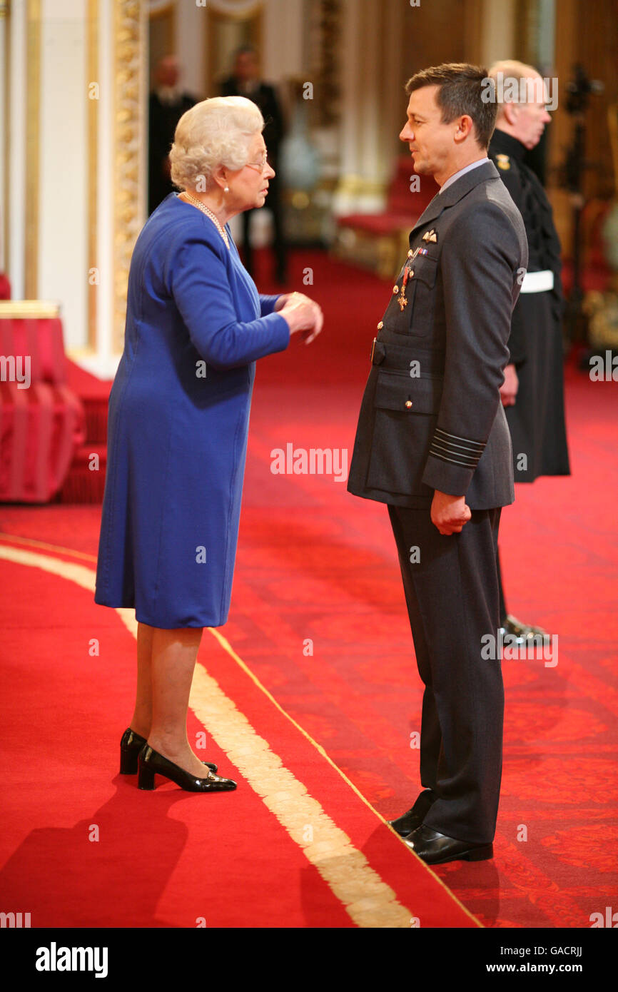 Group Captain Alastair Mackay is made an OBE by The Queen at Buckingham ...