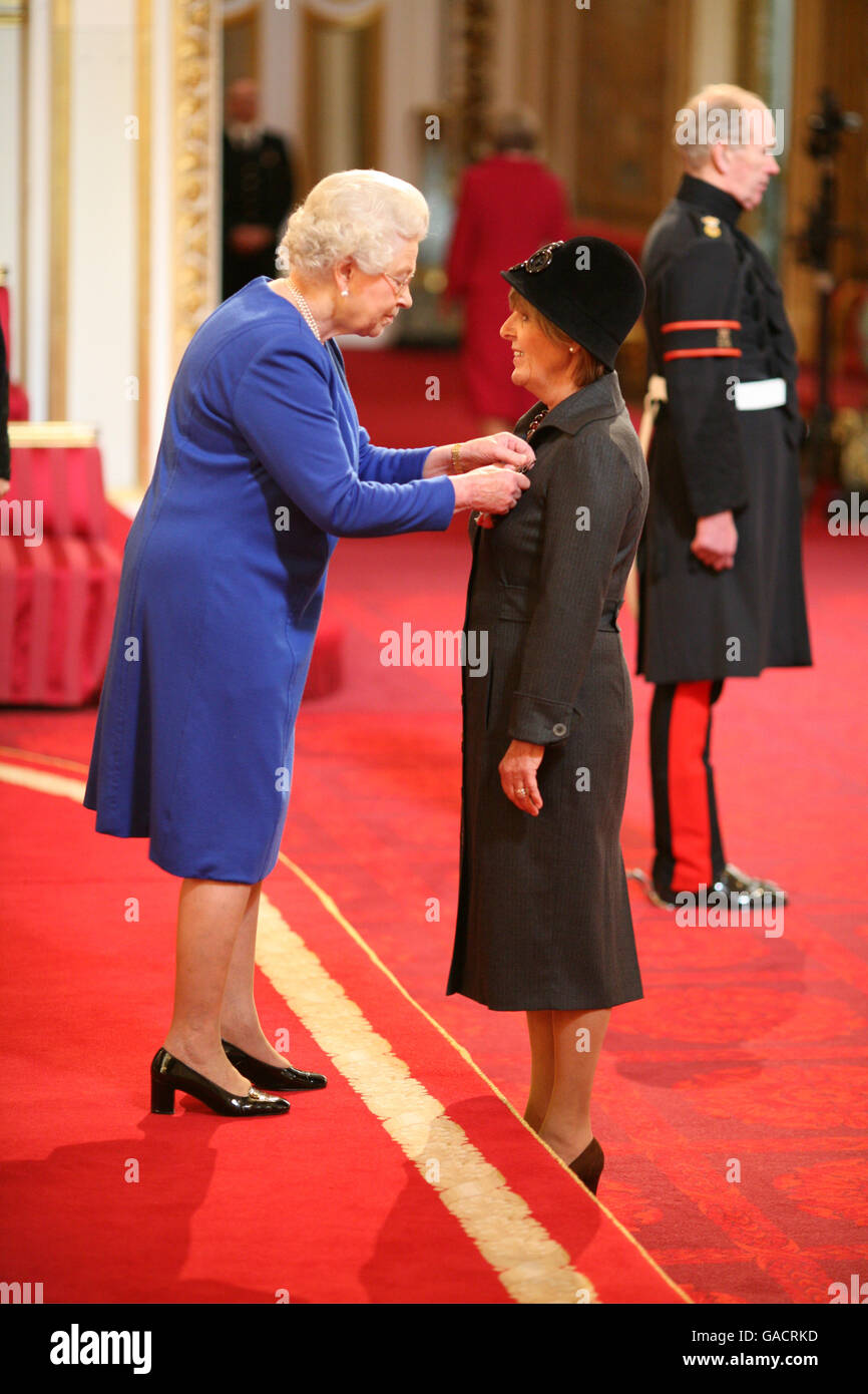Mrs Jane Jason, from London, is made an OBE by The Queen at Buckingham ...