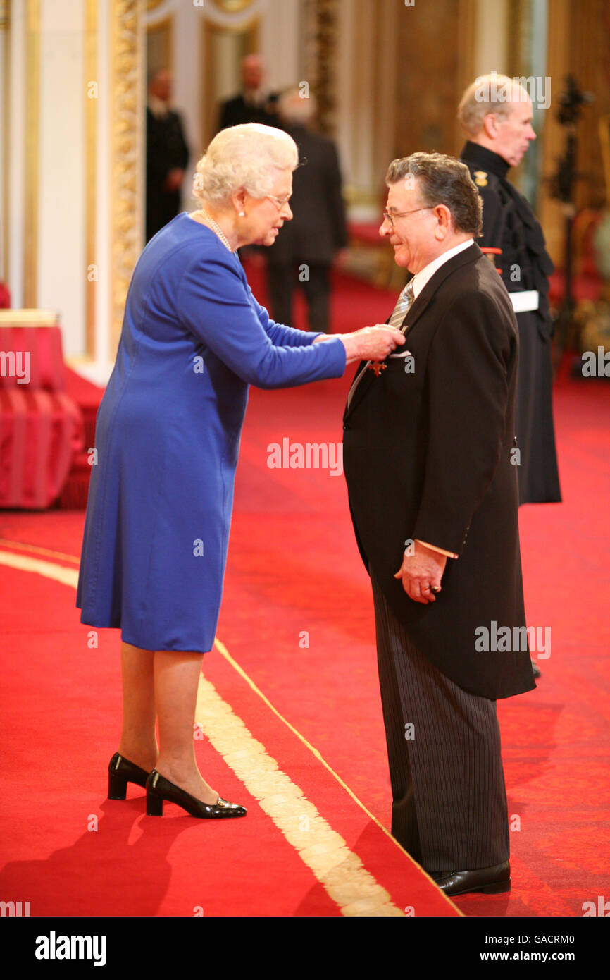 Mr. William O'Neill is made an MBE by The Queen at Buckingham Palace ...
