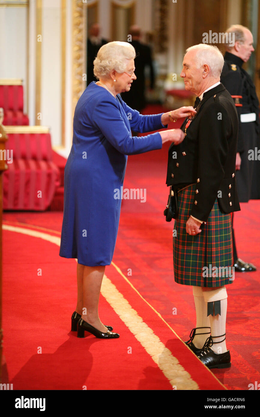 Dr. William Elder, from London, is made an OBE by The Queen at ...