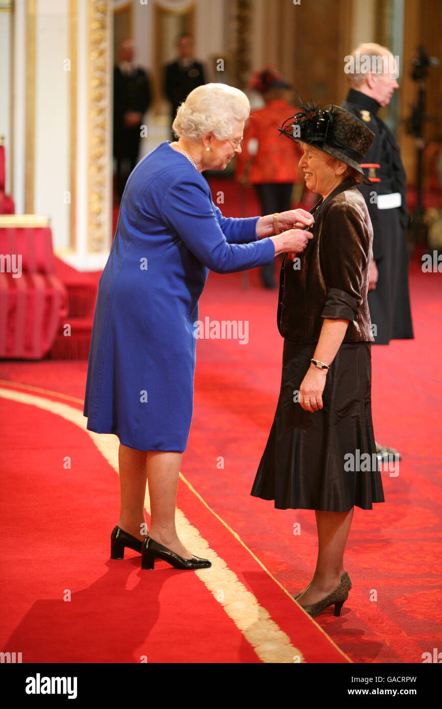 Miss Audrey Damazer, from Leatherhead, is made an OBE by The Queen at ...