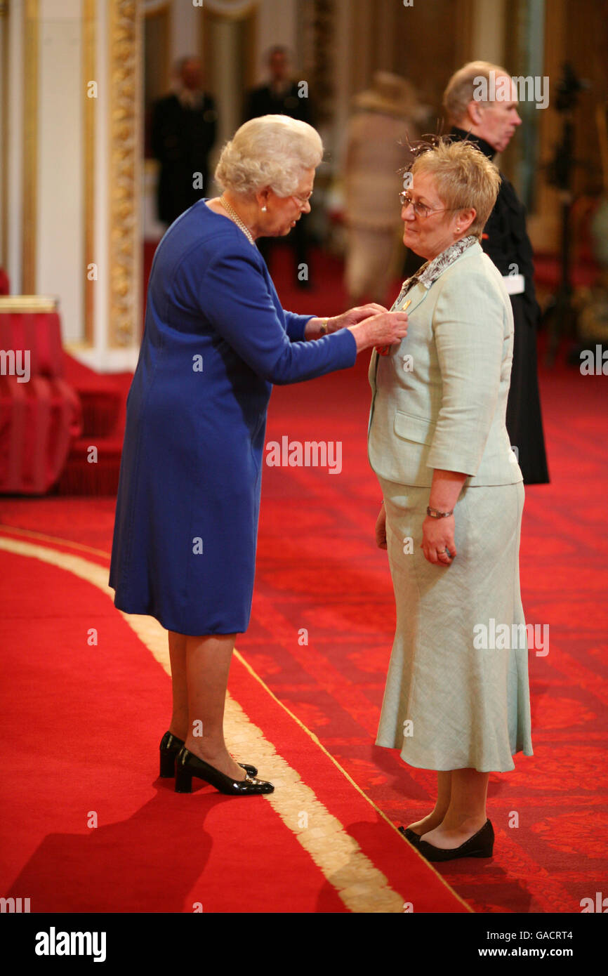 Mrs Faith O'Sullivan, from Portsmouth, is made an MBE by The Queen at ...
