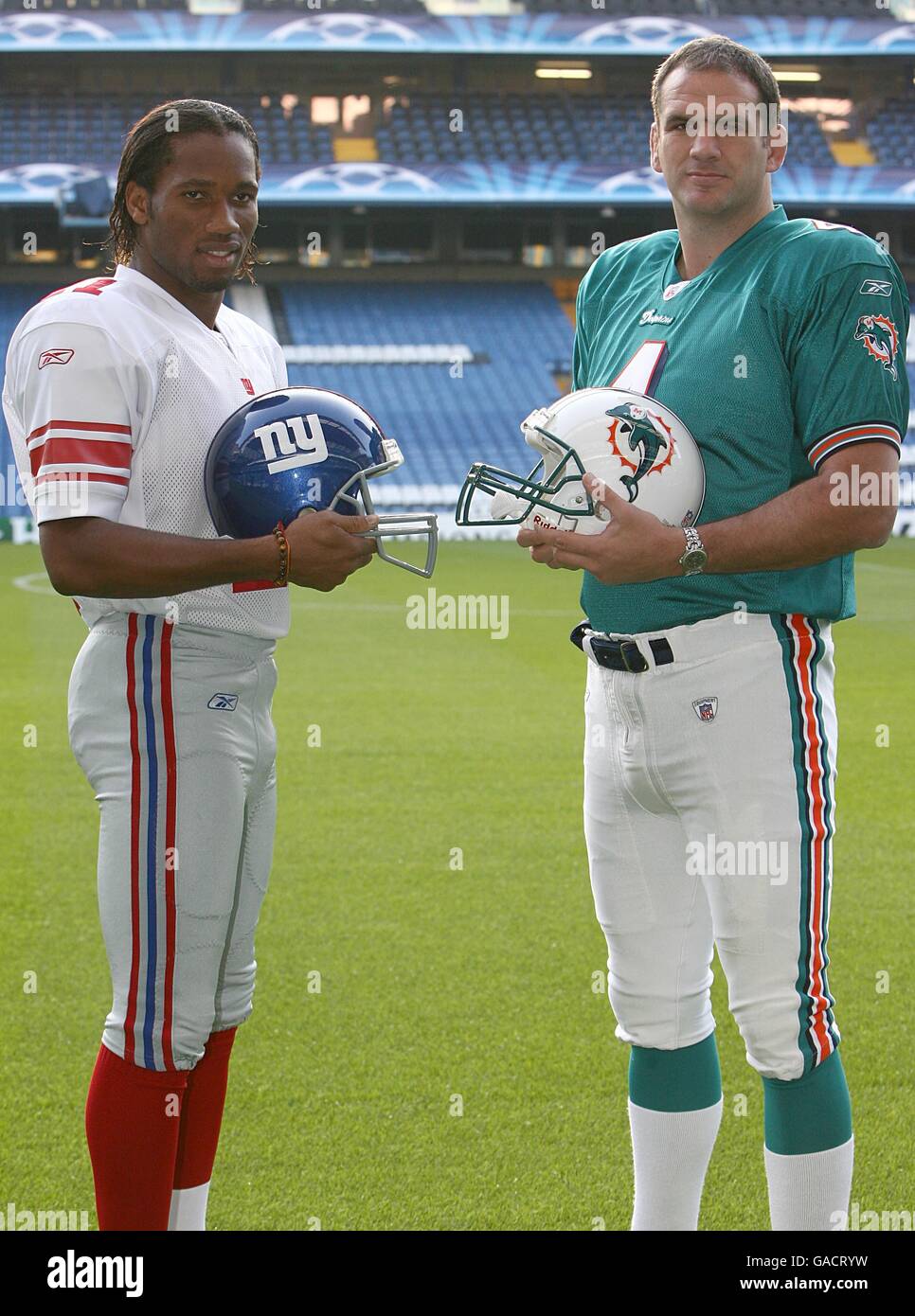 Chelsea's Didier Drogba in the New Yorks Giant's kit and Martin Johnson ...