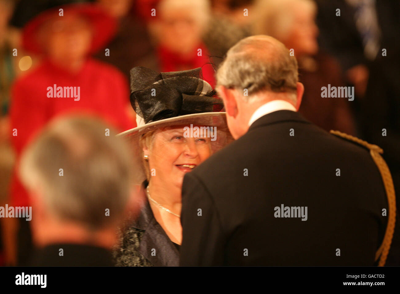 Mrs Norma Bell is made an MBE by the Prince of Wales at Buckingham ...
