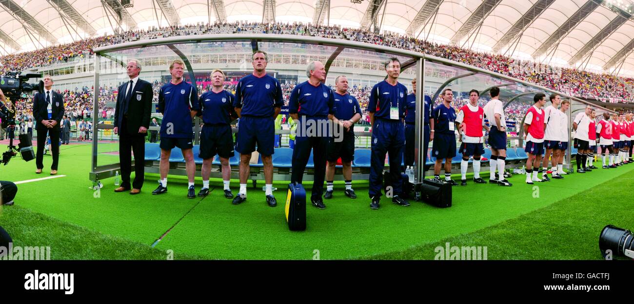 The England team line up for their National anthem prior to the game ...